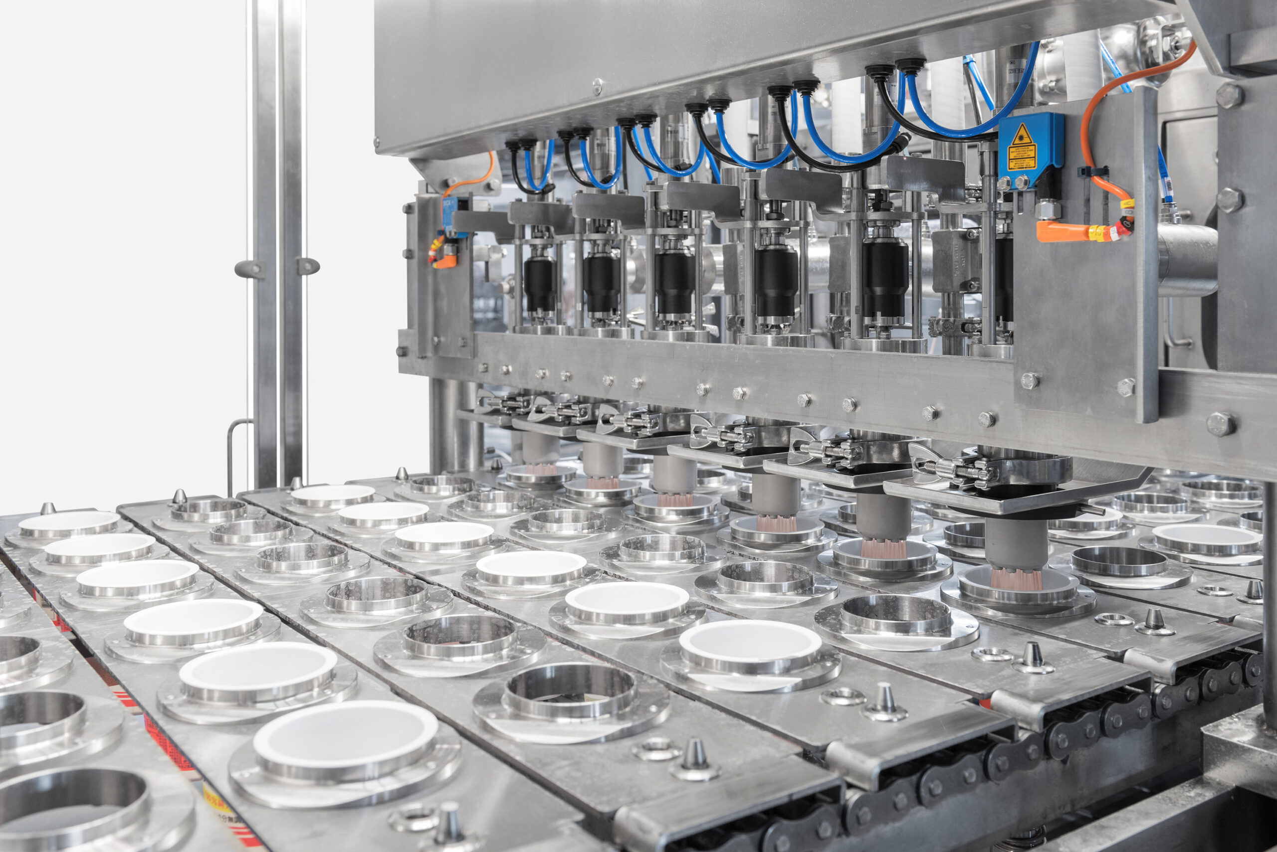 Revolutionizing Dairy Industry Serac s Dairy Cups Filling machines